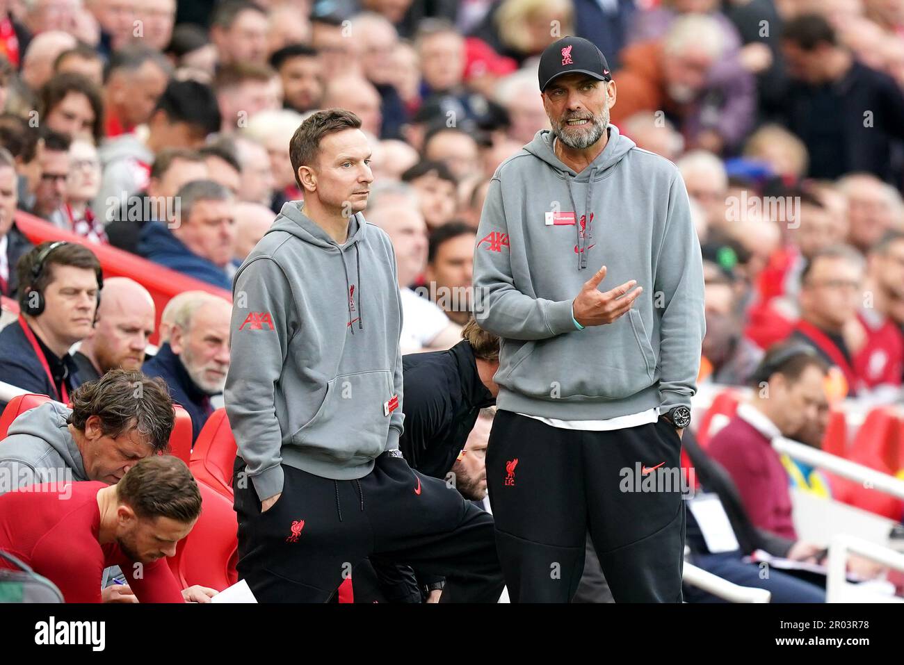 Liverpool manager Jurgen Klopp (right) and assistant manager Pepijn ...