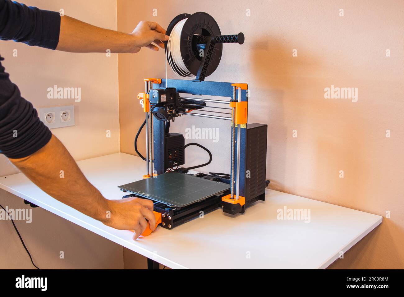 Technological hi-teg tool for making new things. A black and red 3D ...