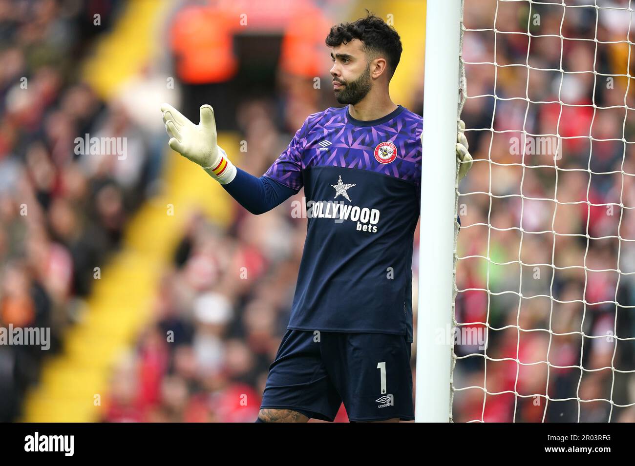 Brentford goalkeeper David Raya arranges his players into a wall prior to a free-kick during the ...