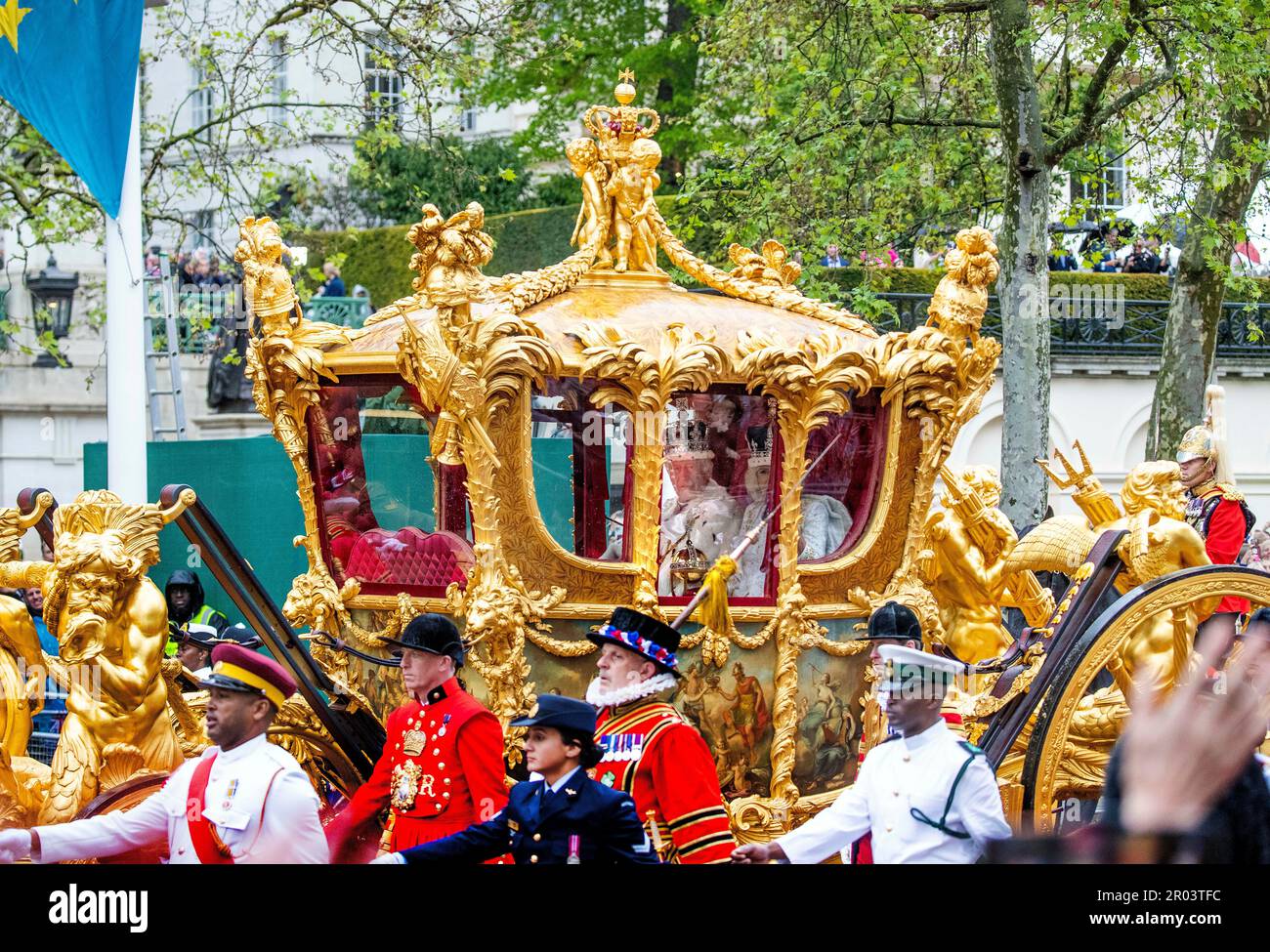 London, UK. 06th May, 2023. King Charles III and Queen Camilla drive in ...