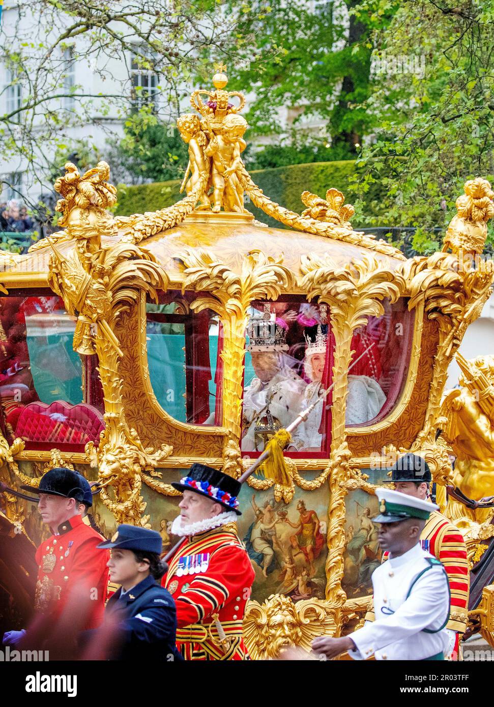 London, UK. 06th May, 2023. King Charles III and Queen Camilla drive in ...