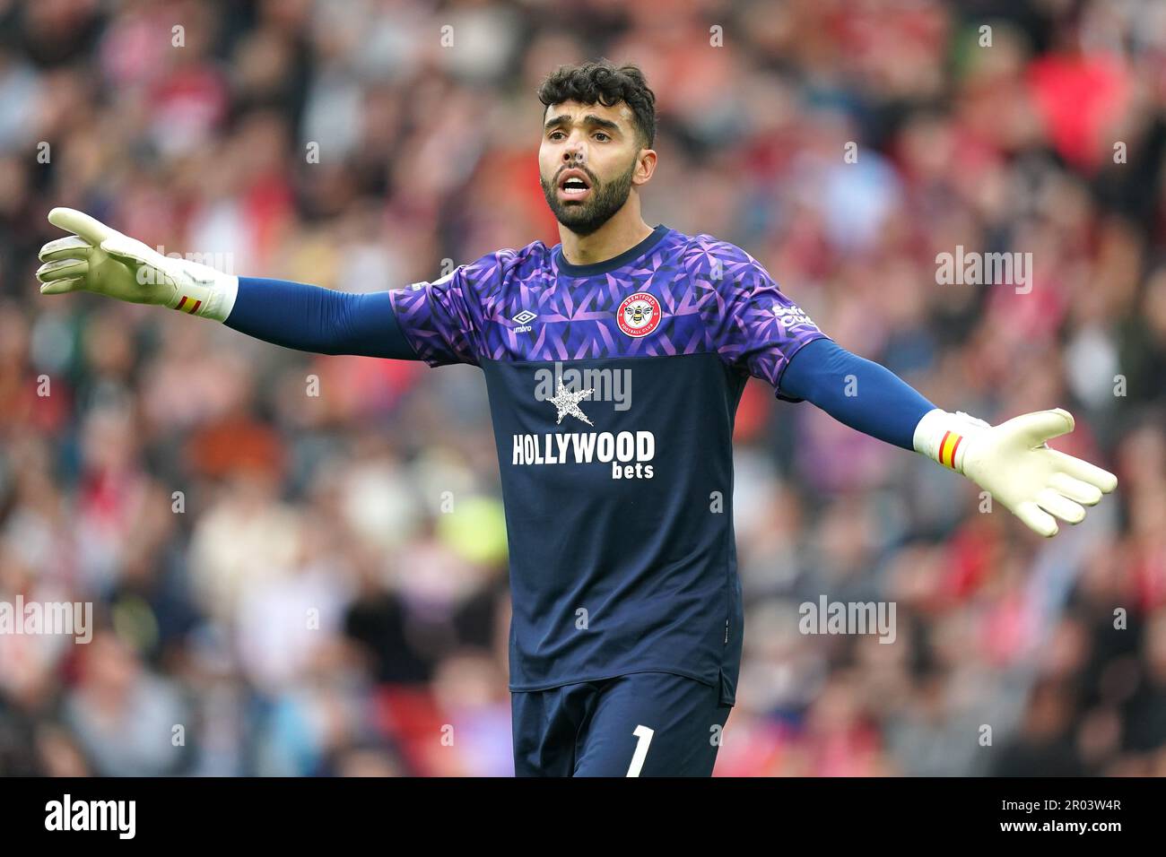 Brentford goalkeeper David Raya reacts during the Premier League match at Anfield, Liverpool ...