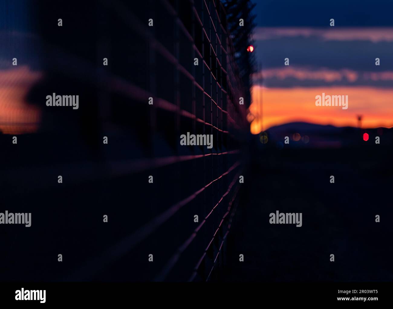 Iron fence detail at night. Barbed wire fence. Abstract illustration ...