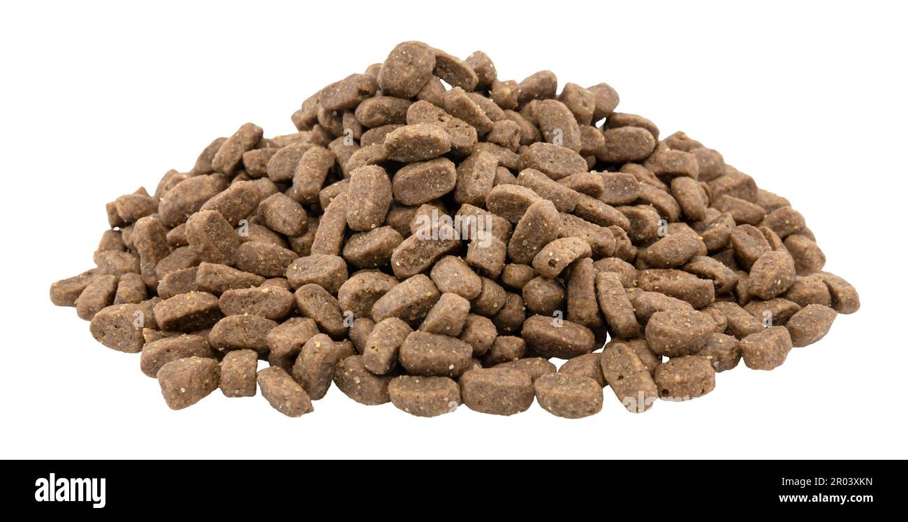 A slide of dry dog food on a white background. Food for dogs and cats ...