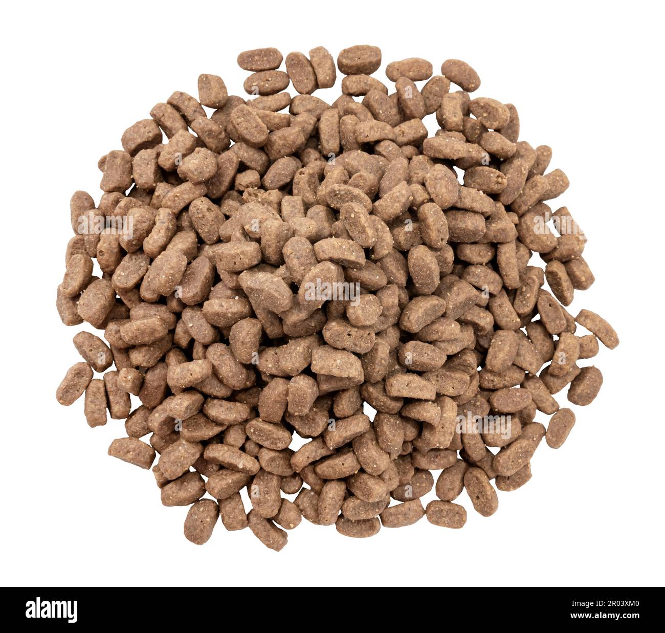 A slide of dry dog food on a white background. Food for dogs and cats ...