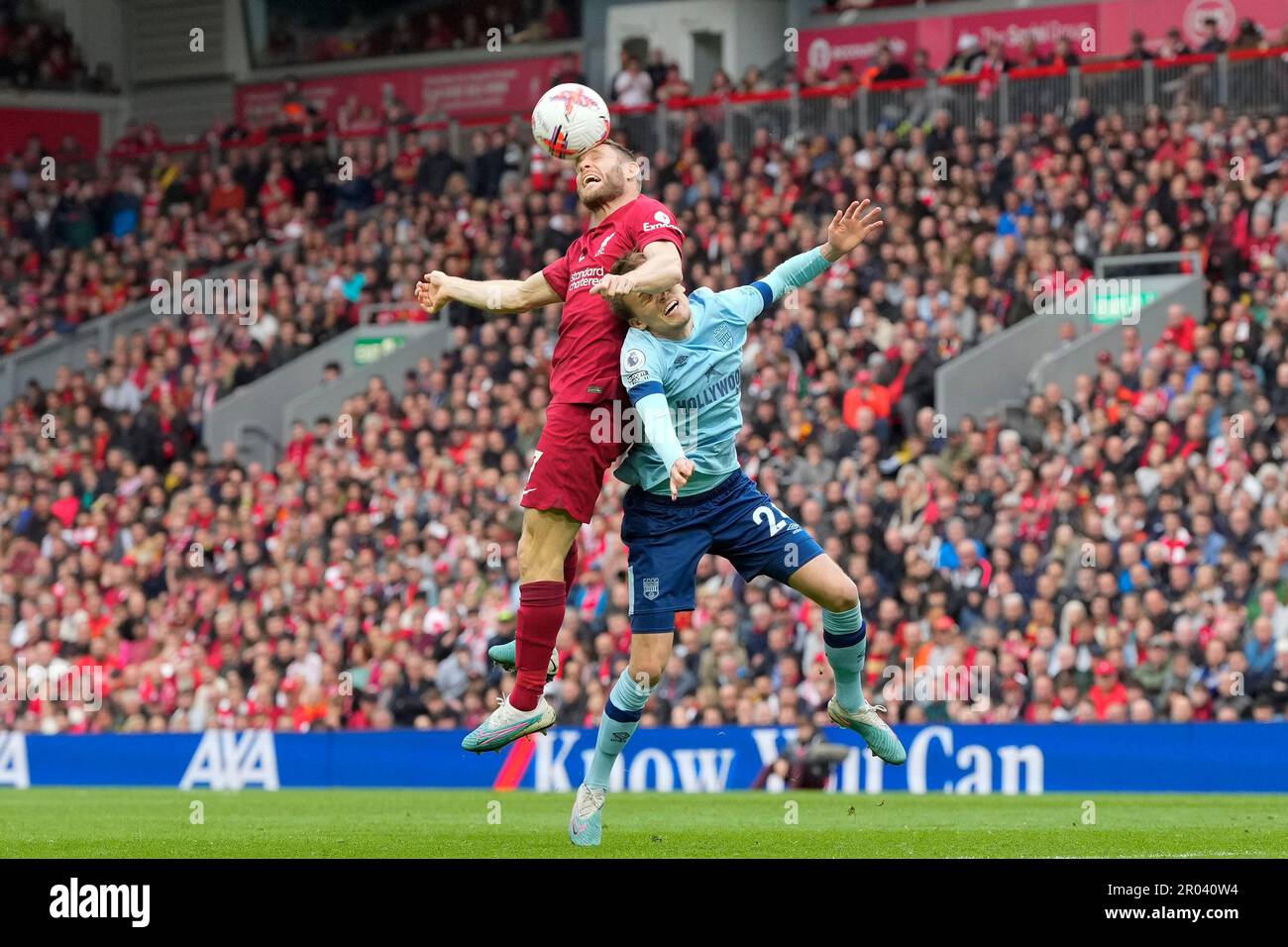 Mikkel Damsgaard #24 of Brentford competes for a header with James ...