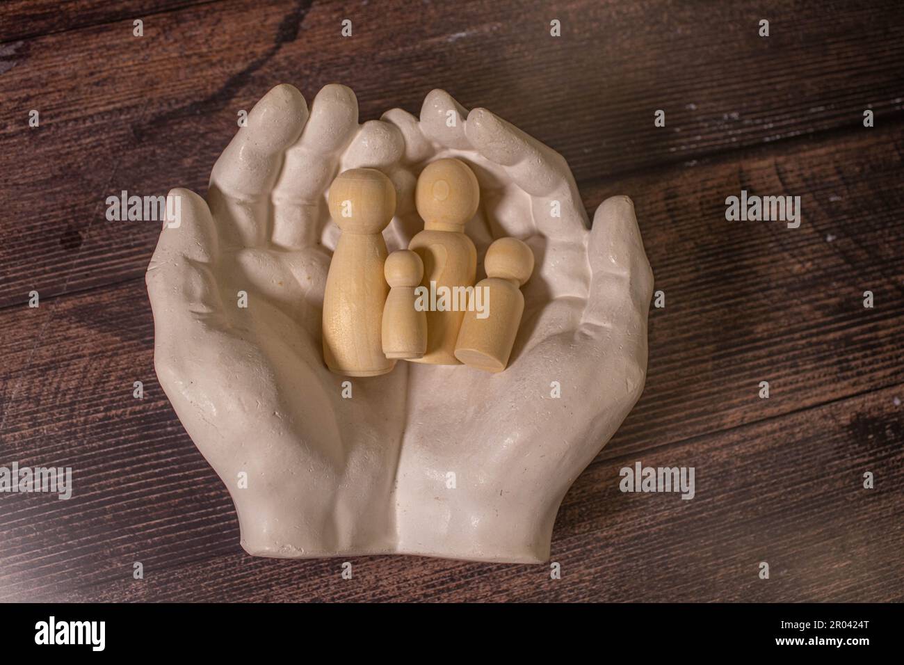 wooden figures peg doll of family members on wood table, Family ...