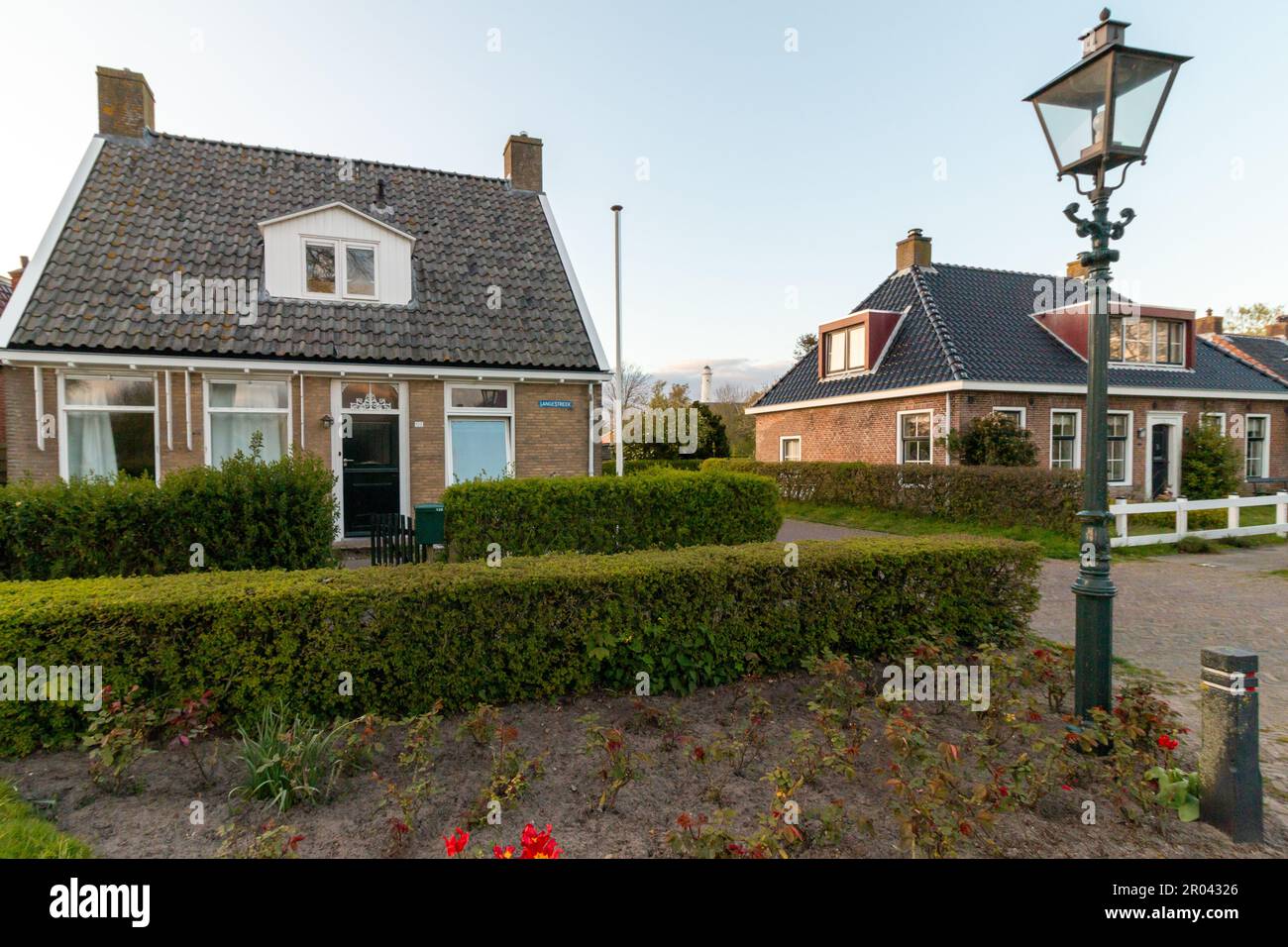 a row of old Dutch traditional houses on the wadden island of ...