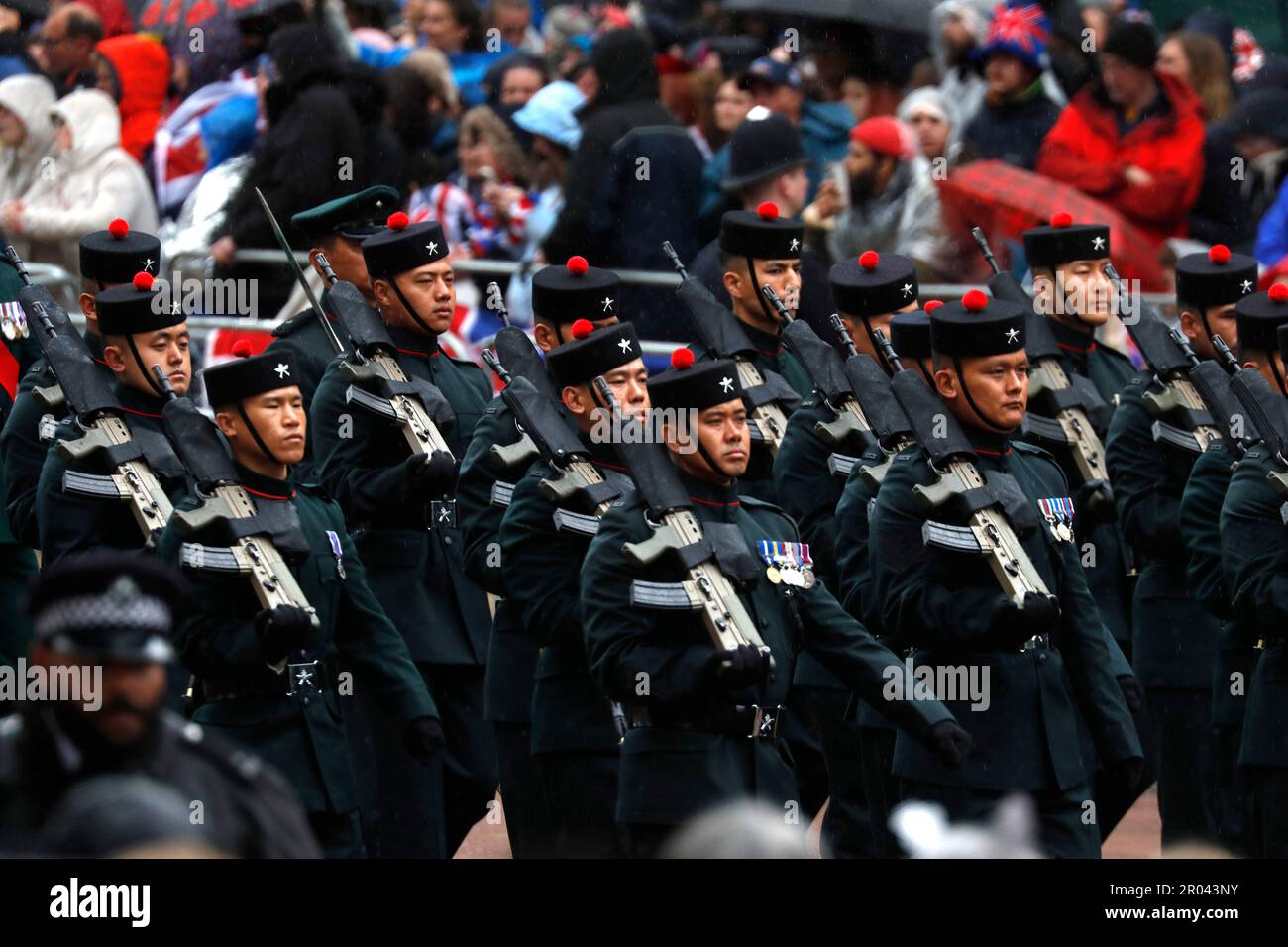 Military procession makes its way down the Mall following King Charles ...