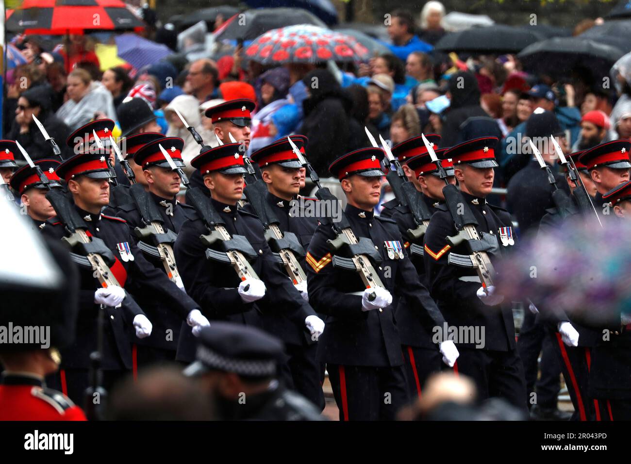 Military procession makes its way down the Mall following King Charles ...