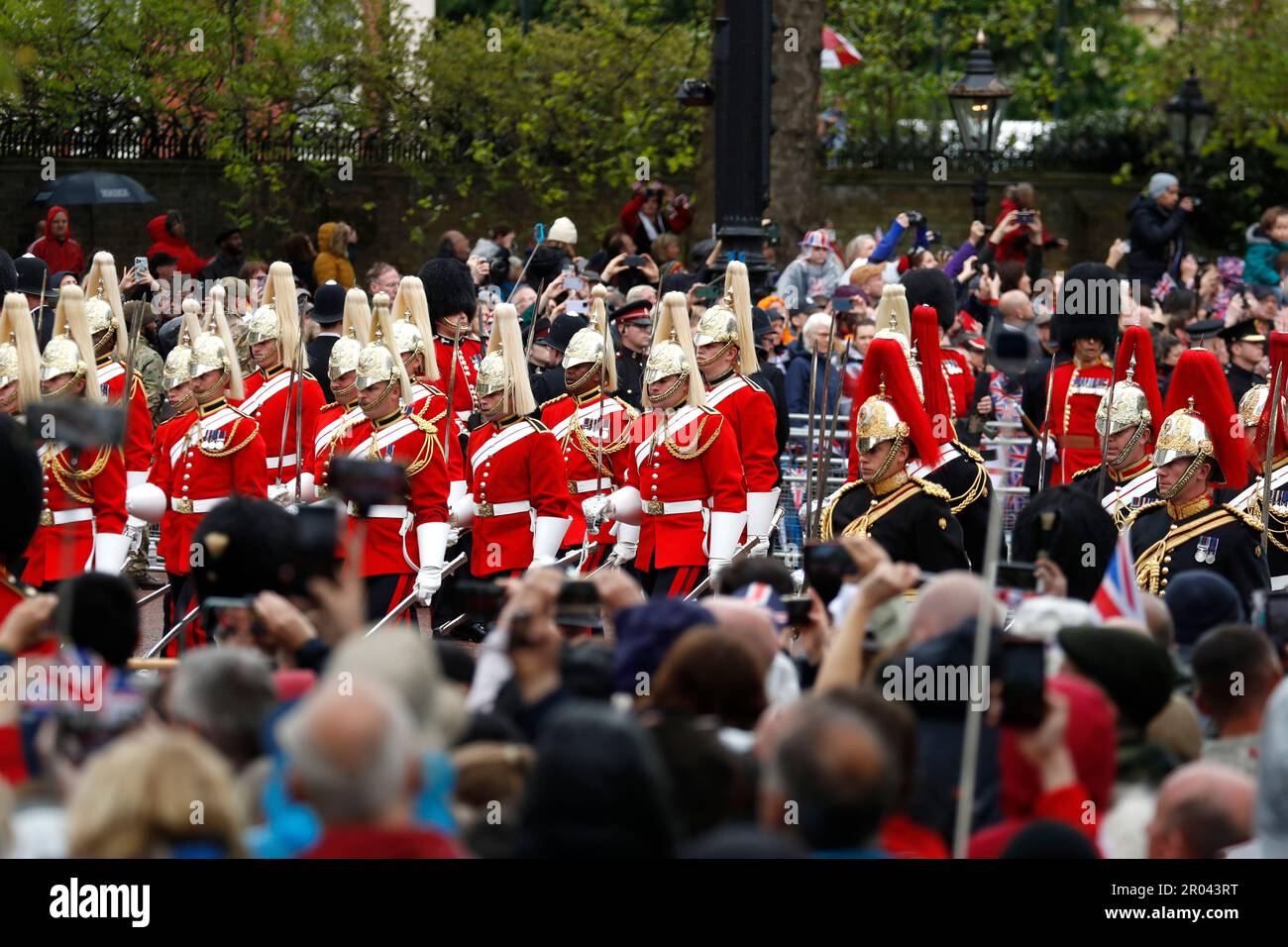 Military procession makes its way down the Mall following King Charles ...