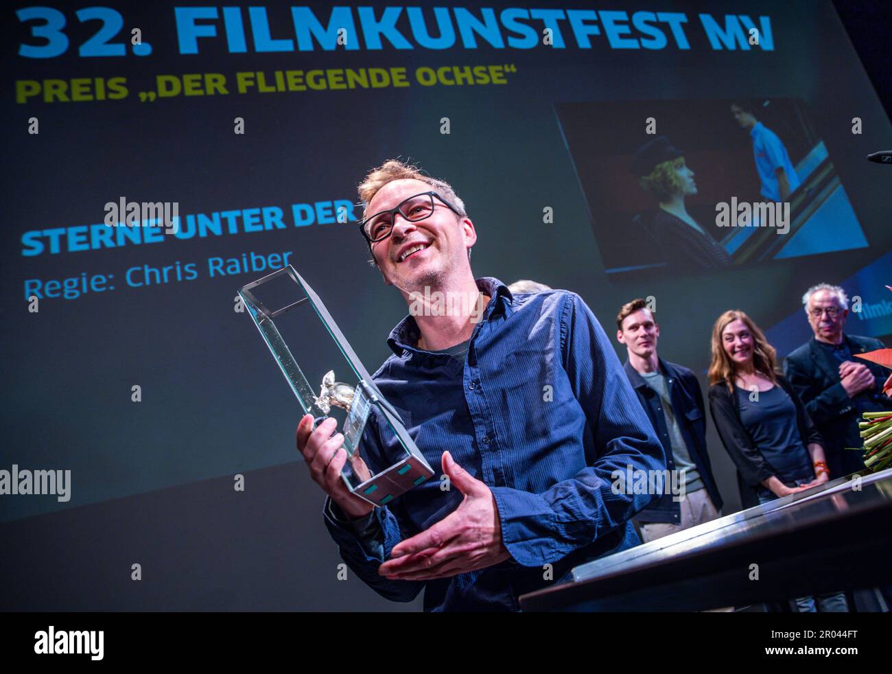 Schwerin, Germany. 06th May, 2023. Director Chris Raiber receives the ...