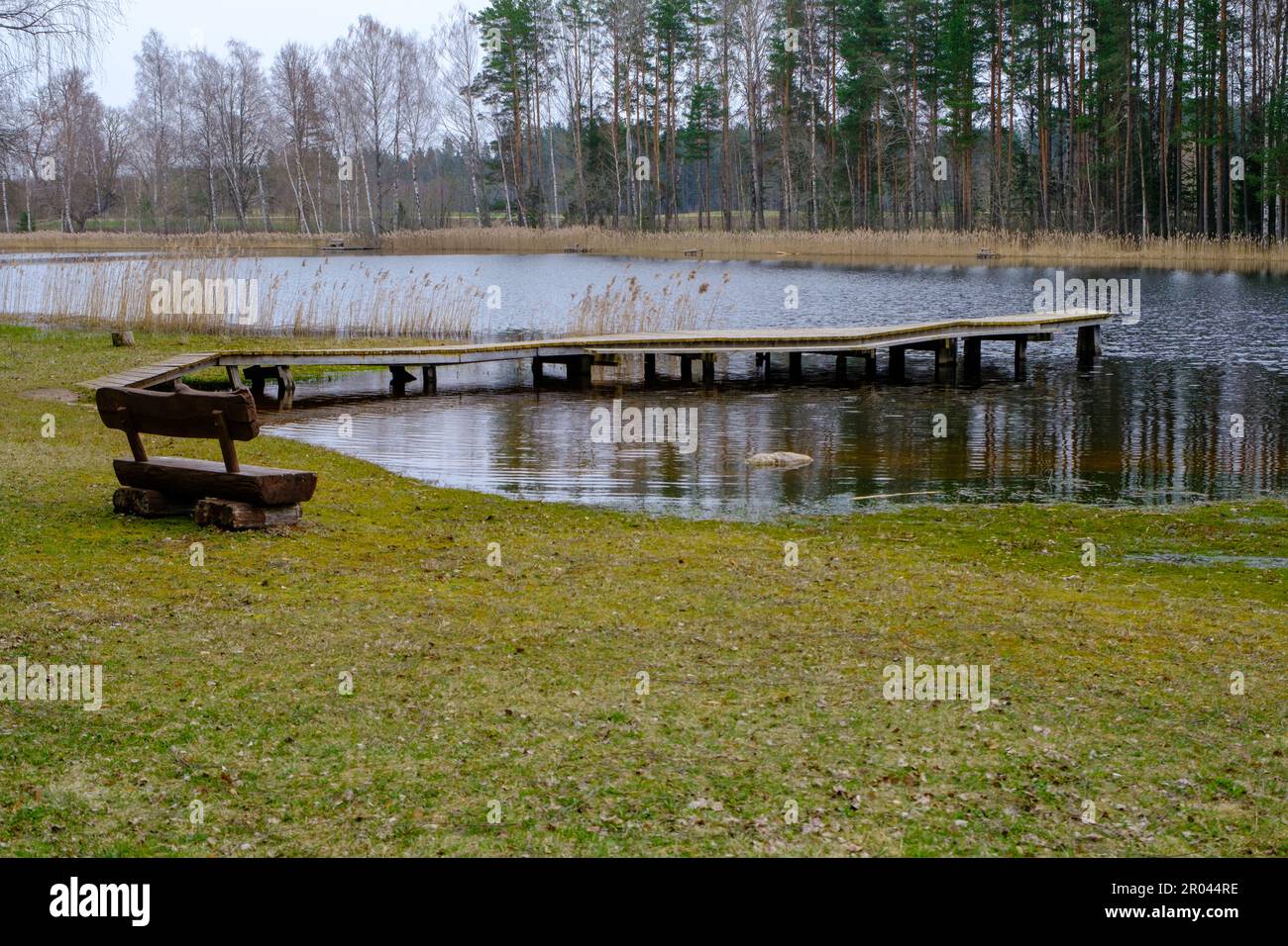 a small wooden boardwalk in the lake. bathing place Stock Photo - Alamy