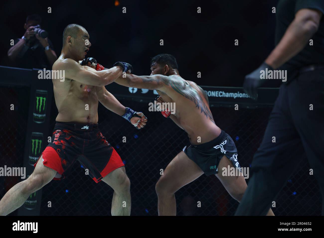 DENVER, COLORADO - MAY 5: (R-L) Fan Rong lands a jab on Fan Rong during ...
