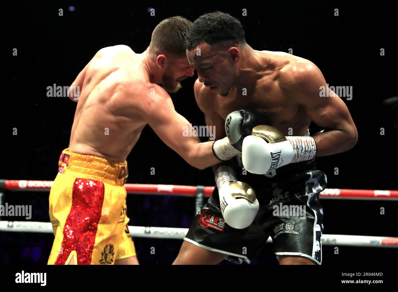 Macauley McGowan (left) strikes Tyler Denny in the Vacant EEU ...