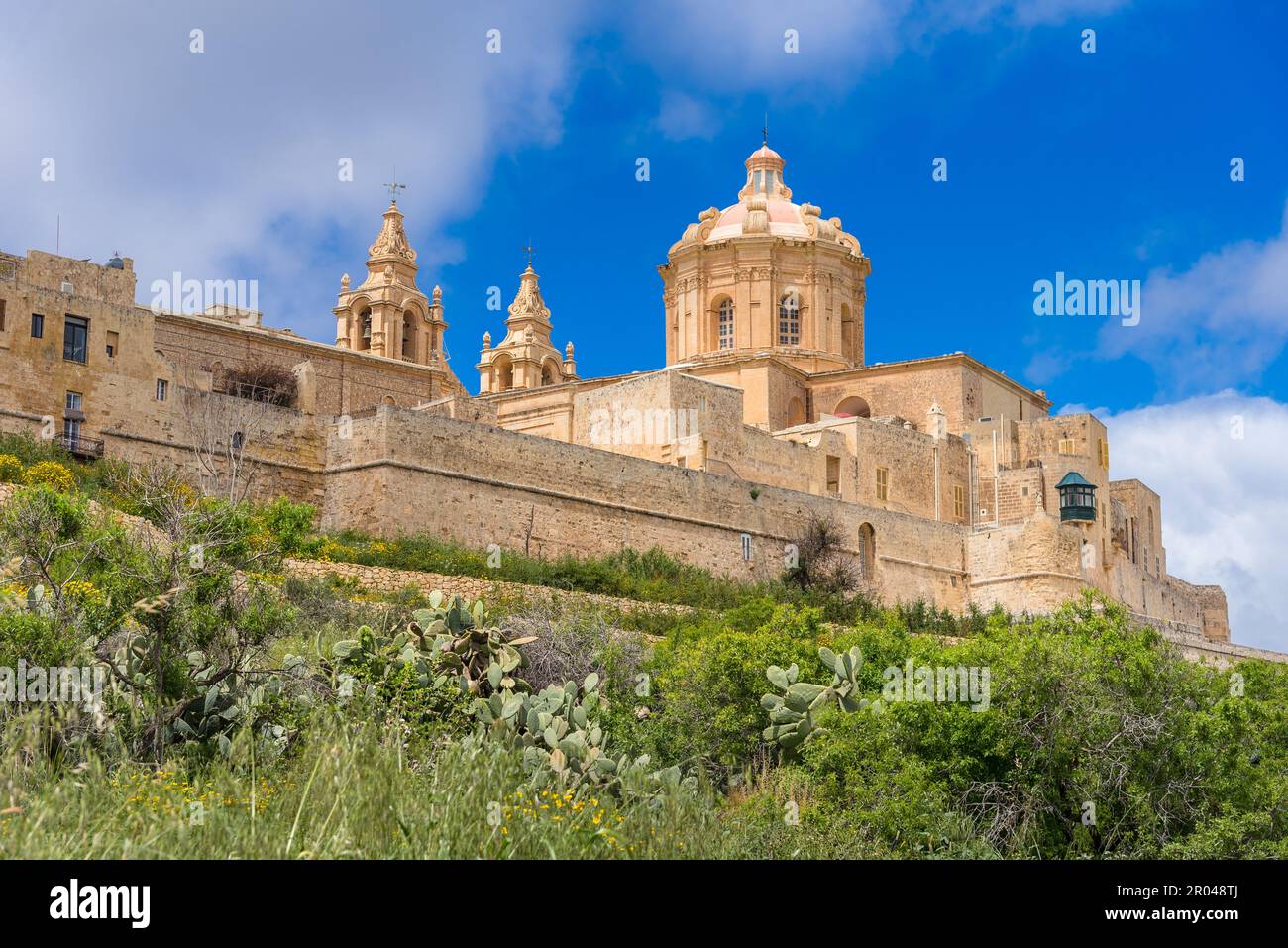 A view of old Mdina street with a traditional Maltese style openwork ...