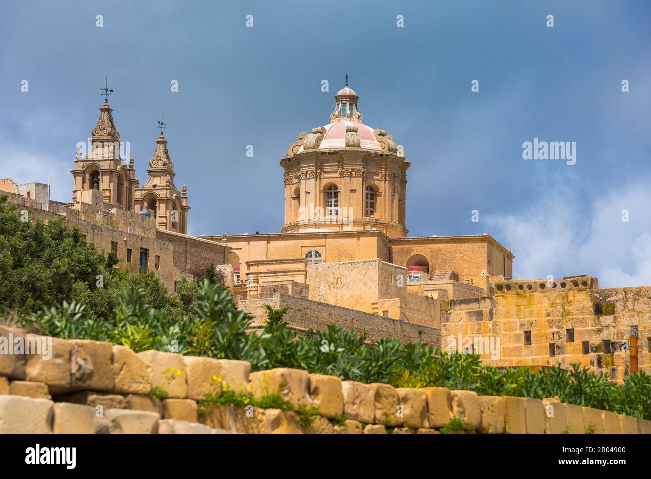 A view of old Mdina street with a traditional Maltese style openwork ...