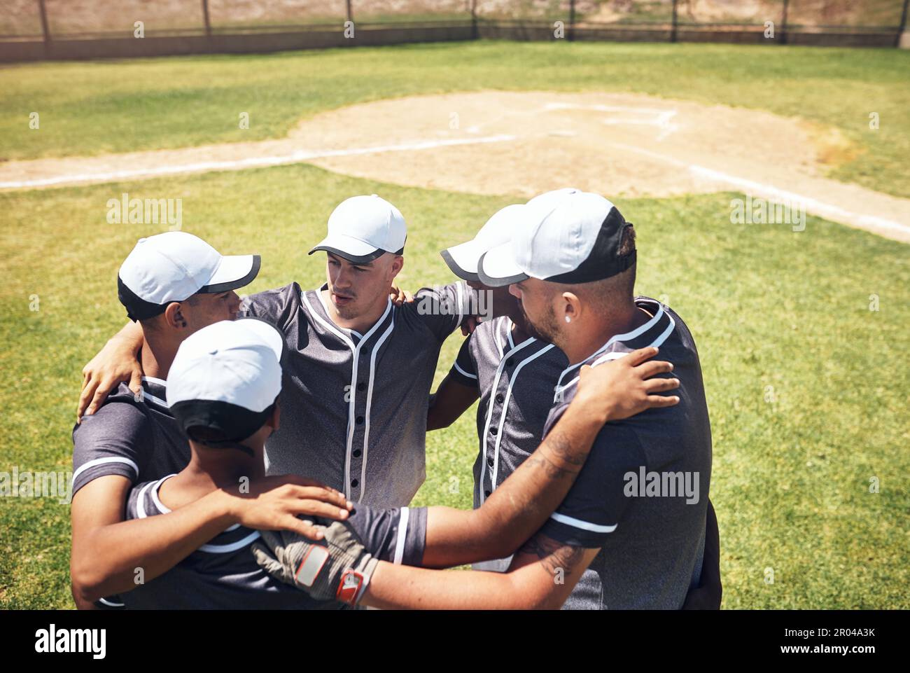 Group people huddled together hi-res stock photography and images - Alamy