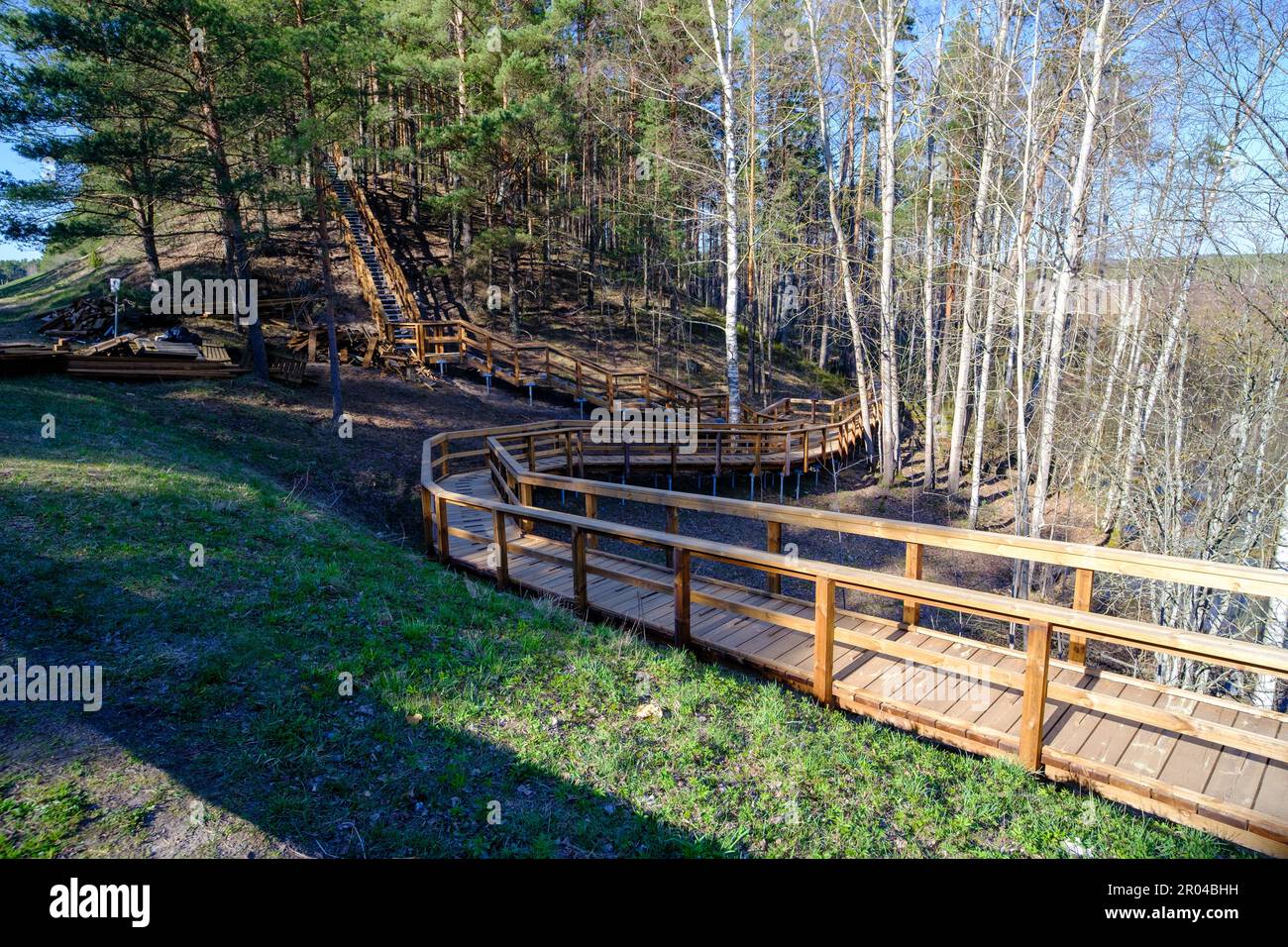 Wooden stairs with elevated walkway under construction, new ...