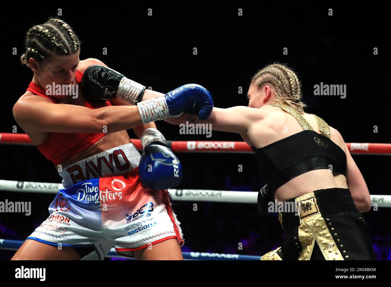 Lauren Price (right) strikes Kirstie Bavington in the Inaugural British ...