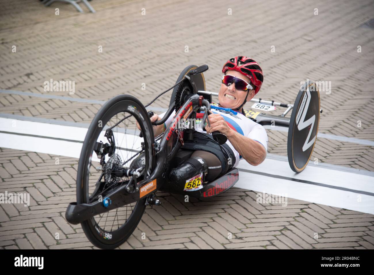 Leading female hand cyclist hi-res stock photography and images - Alamy