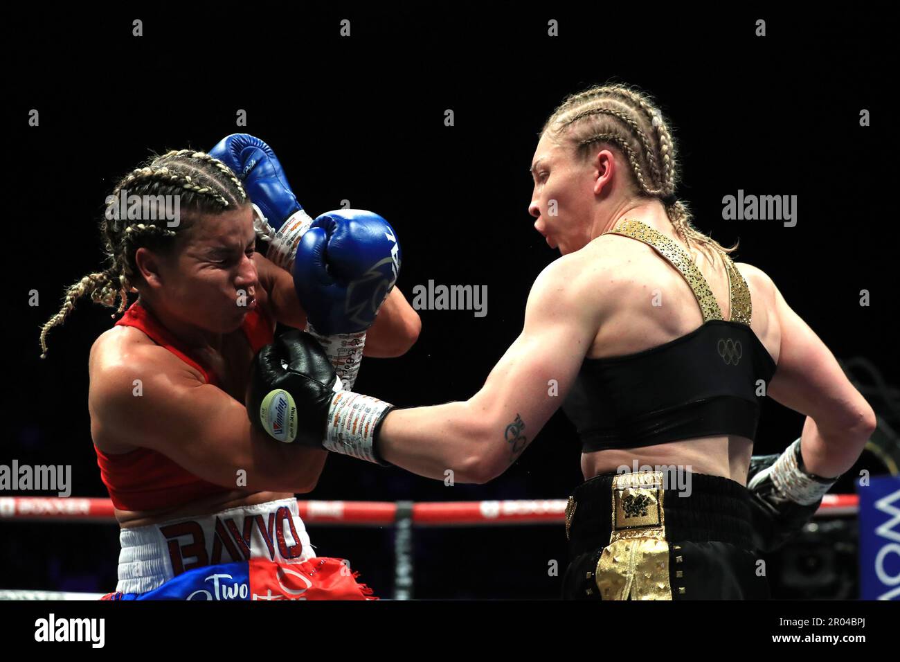 Lauren Price (right) strikes Kirstie Bavington in the Inaugural British ...
