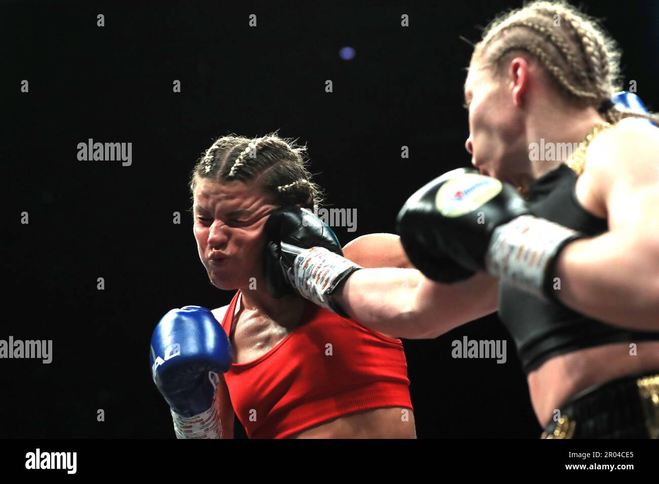Lauren Price (right) strikes Kirstie Bavington in the Inaugural British ...