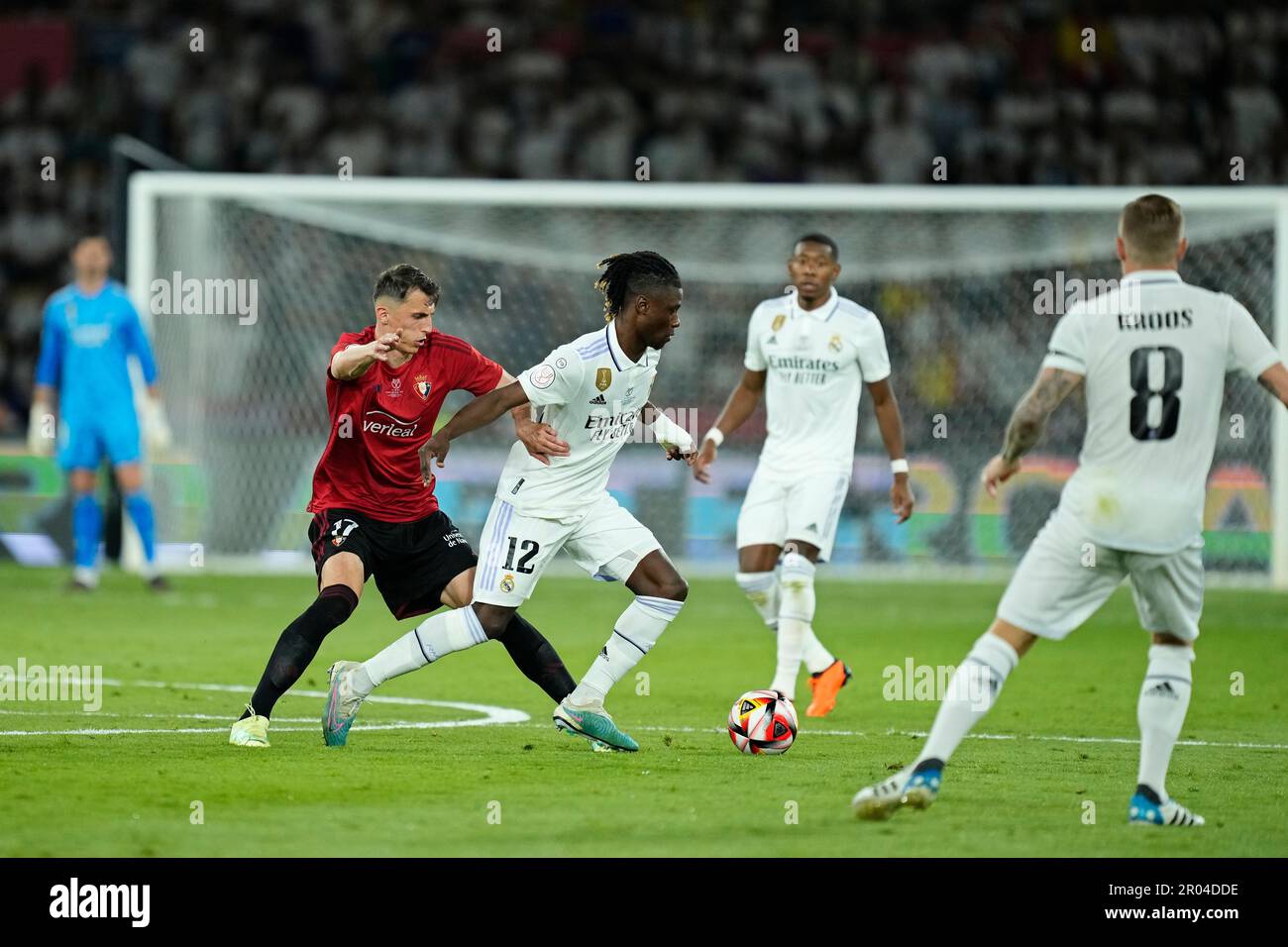 Real Madrid's Eduardo Camavinga, centre left is challenged by Osasuna's ...