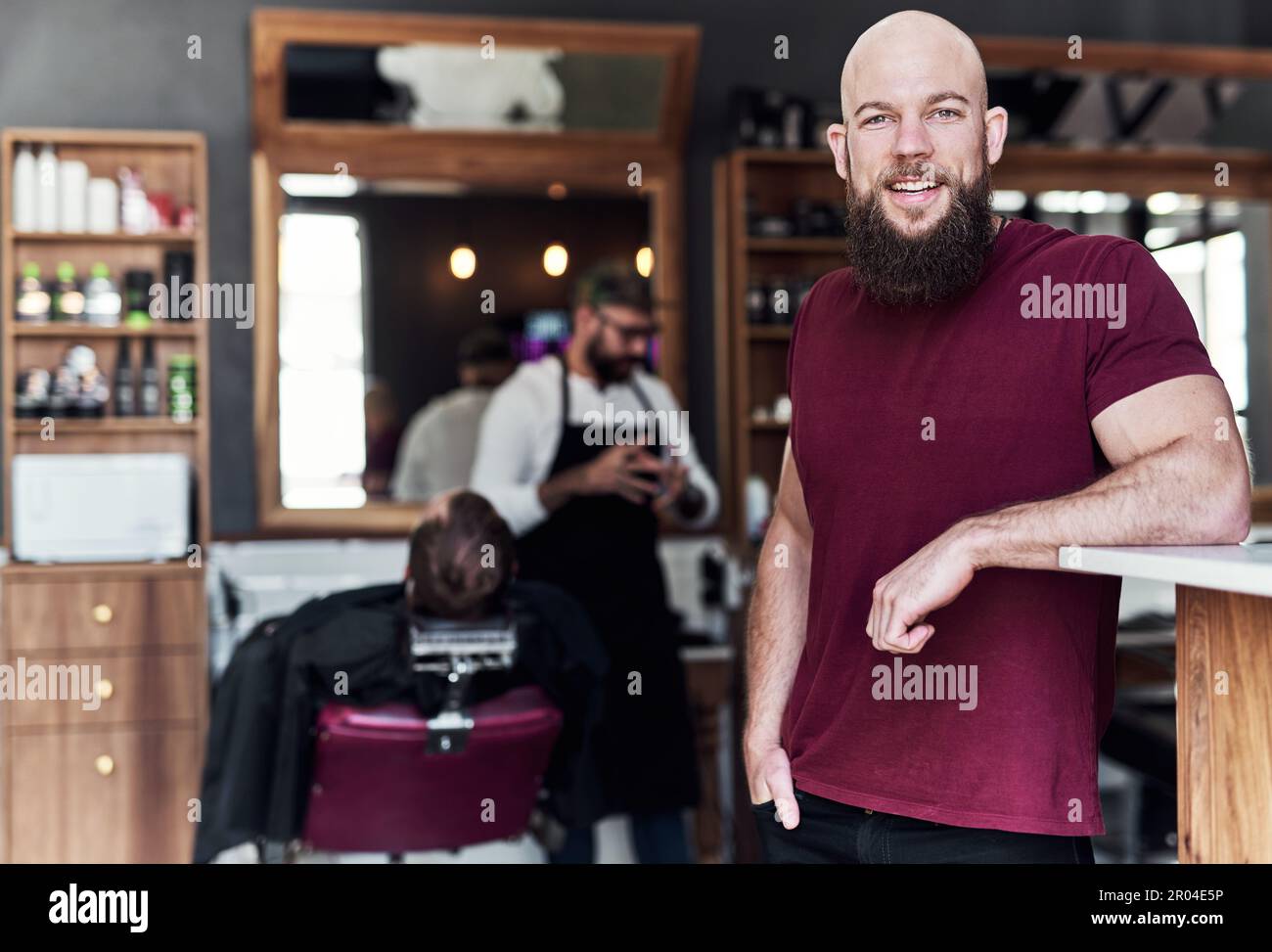 Were the best barbers in the town. Portrait of a handsome young barber ...