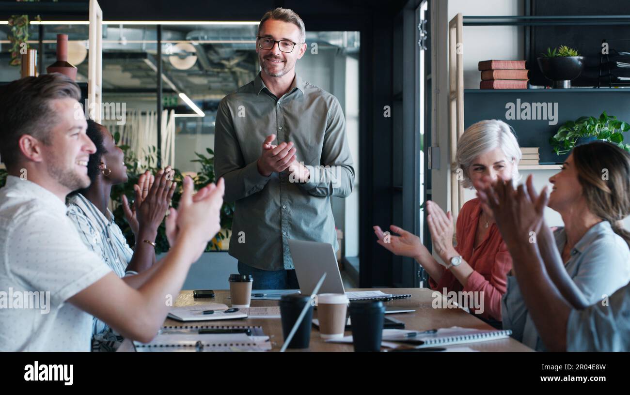 Positive employees inspire positive changes. a group of businesspeople ...