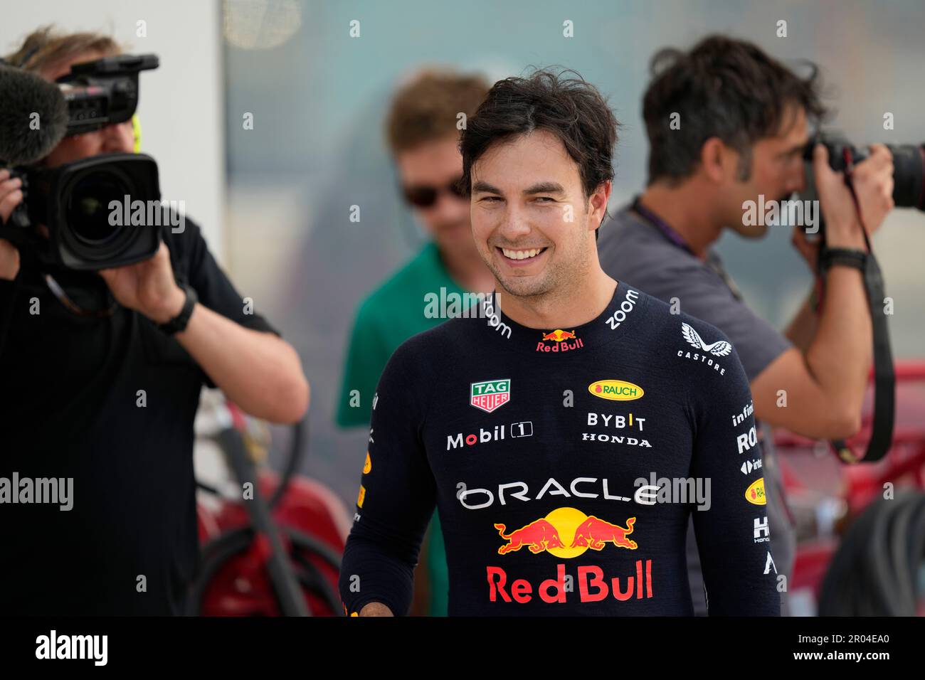 Red Bull driver Sergio Perez of Mexico reacts after finishing first ...