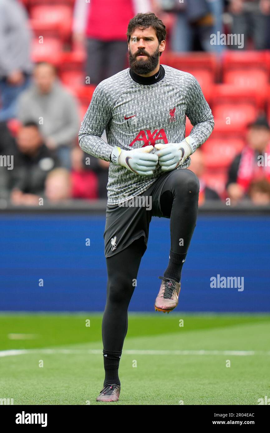 Alisson Becker #1 of Liverpool warms up before the Premier League match ...