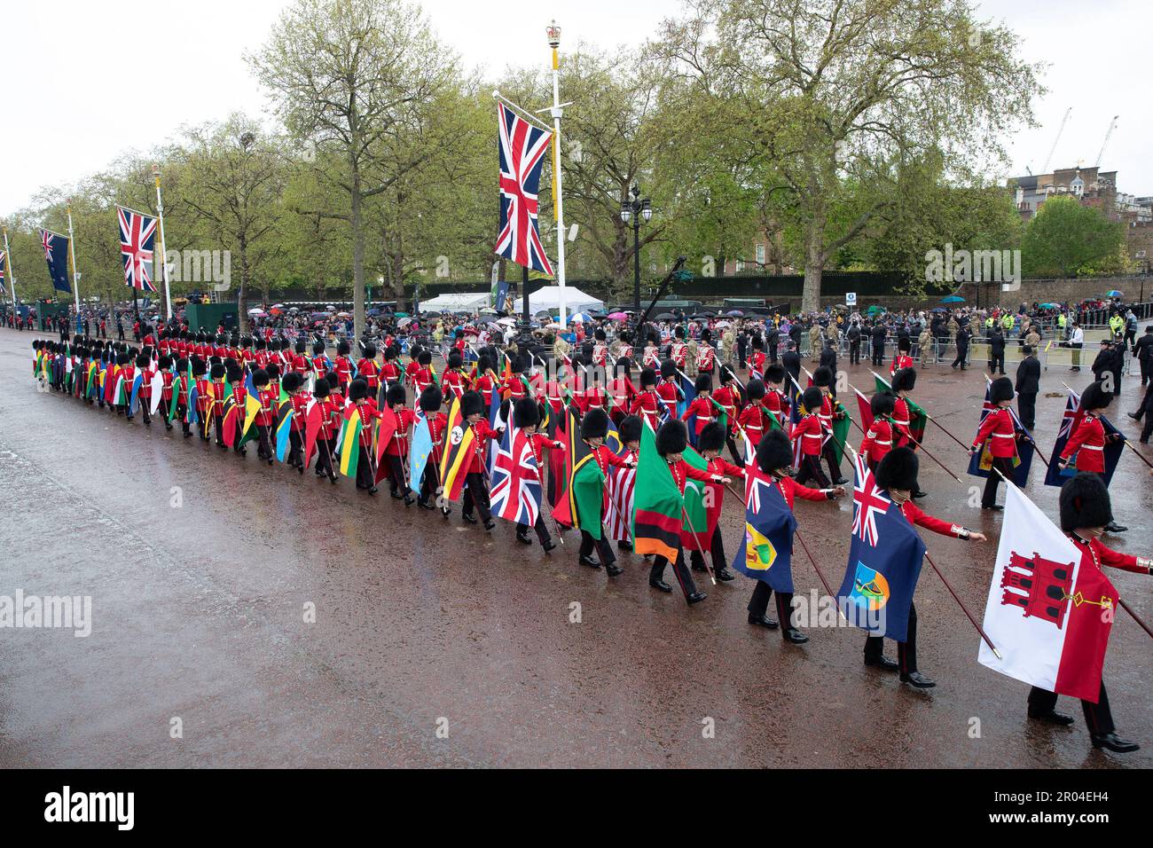Members of the Household Divison march with flags of the commonwealth ...
