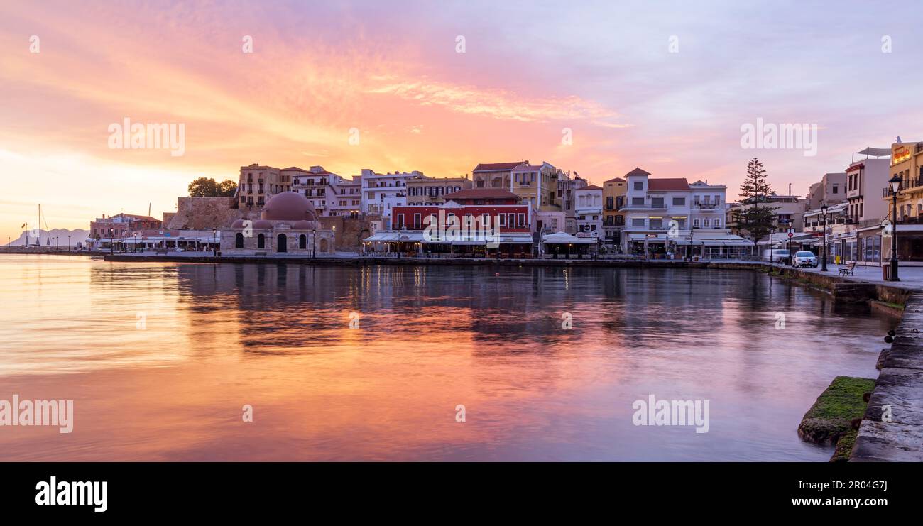 venetian harbour in the city of Chania, Crete, at sunrise Stock Photo ...