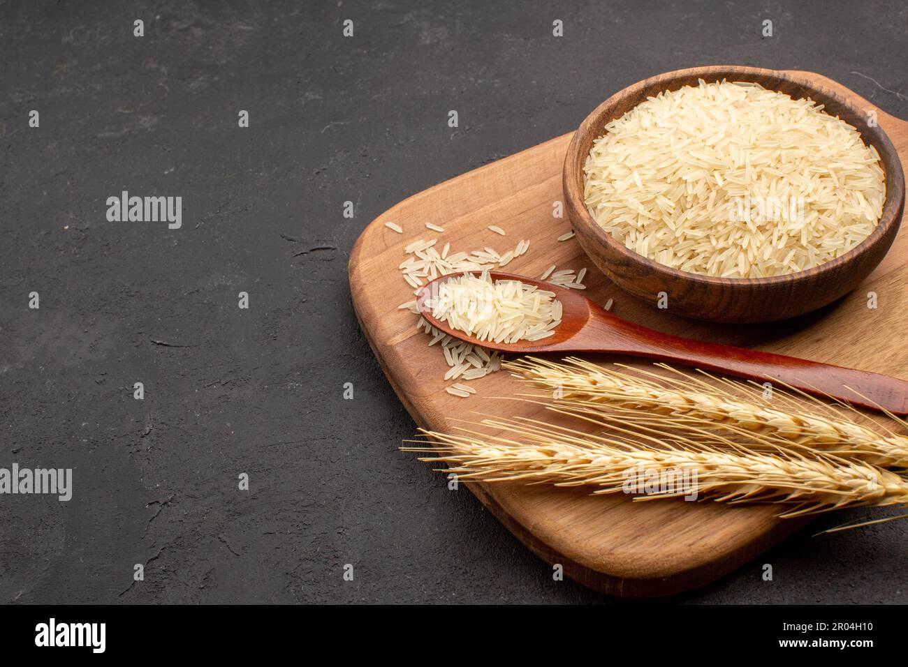 front view raw rice inside plate on a grey background rice raw meal ...
