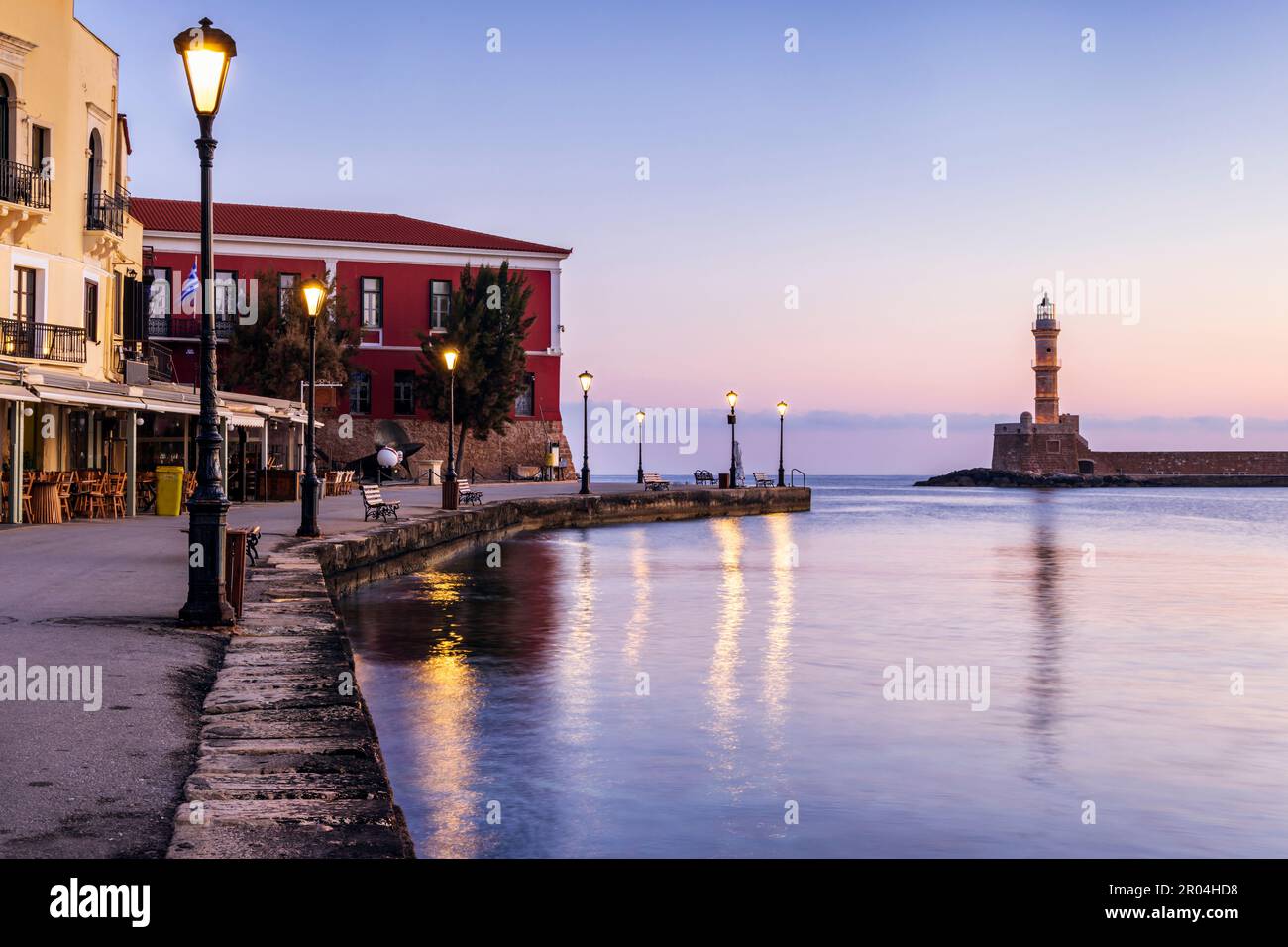 Venetian harbour and lighthouse at dawn in Chania, Crete, Greece Stock ...