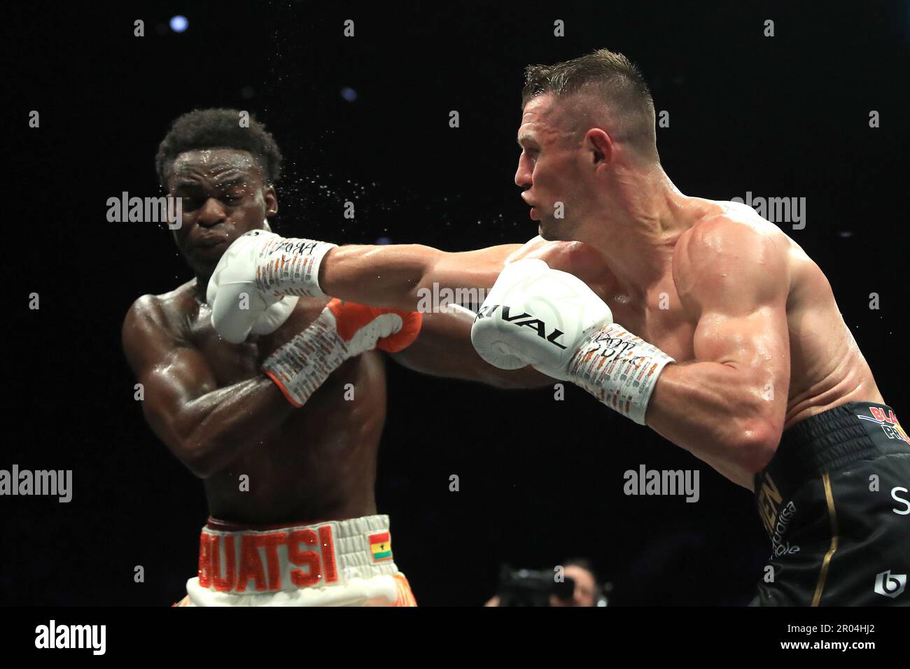 Pawel Stepien (right) strikes Joshua Buatsi in the light-heavyweight ...