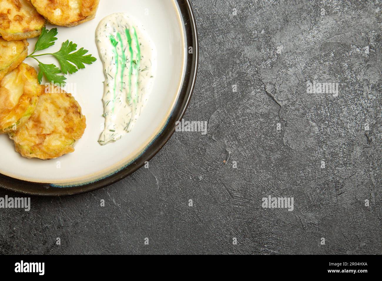 top view cooked squashes slices inside plate on the grey background ...
