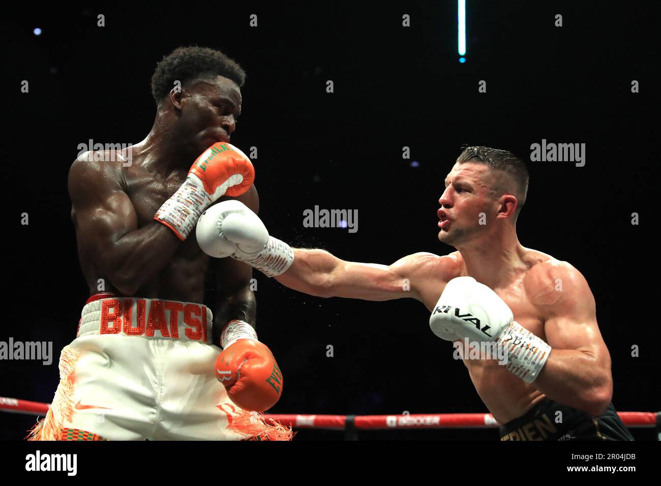 Pawel Stepien (right) in action against Joshua Buatsi in the light ...