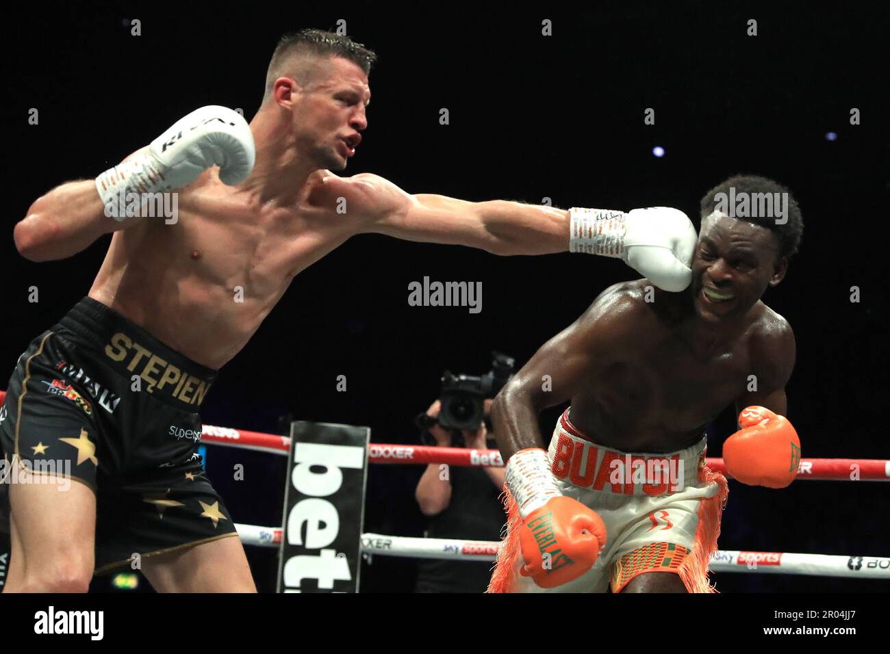 Pawel Stepien (left) strikes Joshua Buatsi in the light-heavyweight ...