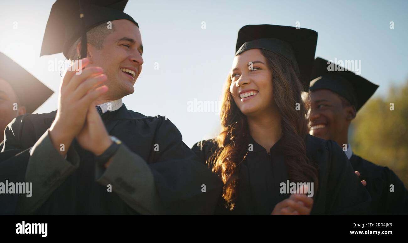We actually made it to the top. a group of cheerful young students ...
