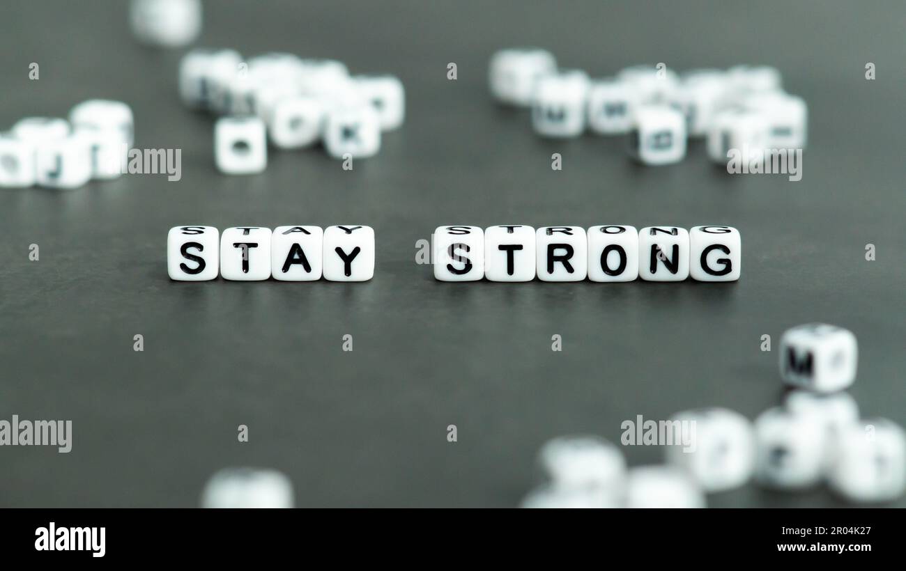 Stay strong motivational quote in black letters on white background ...