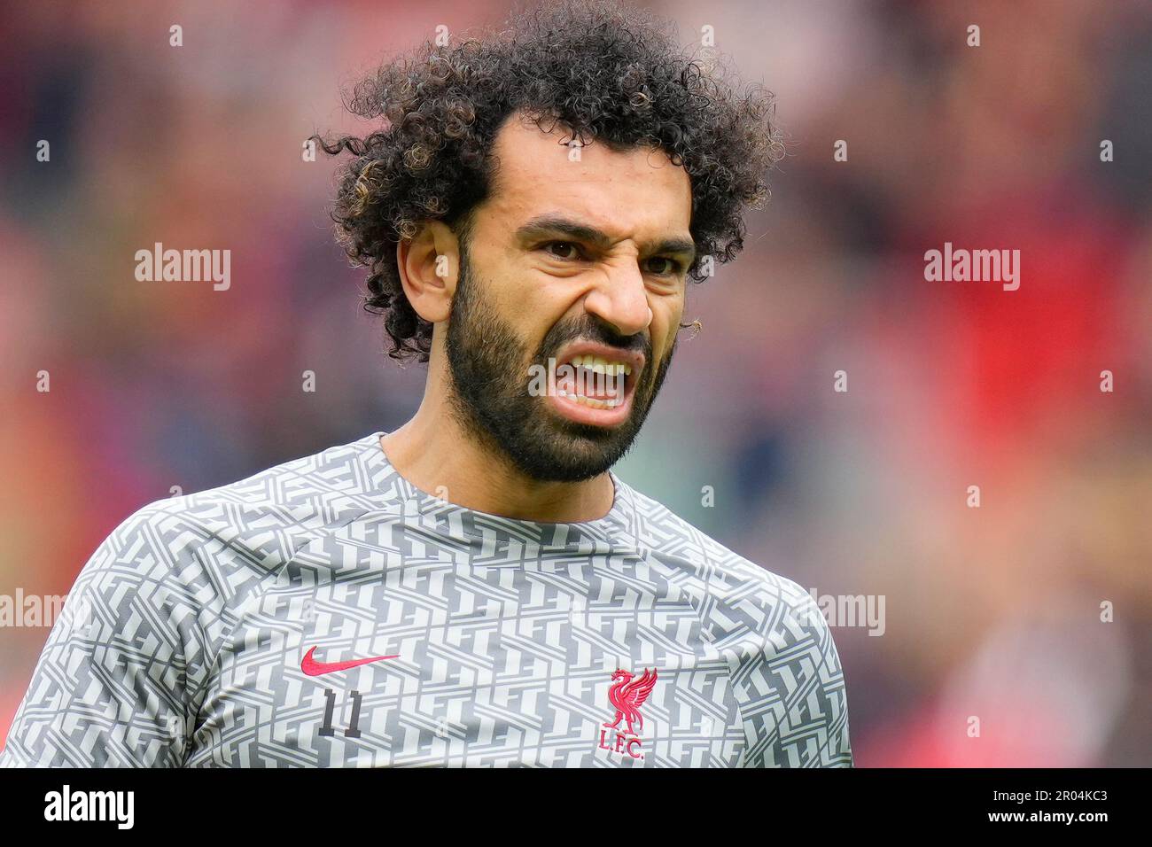Mohamed Salah #11 of Liverpool warms up before the Premier League match ...