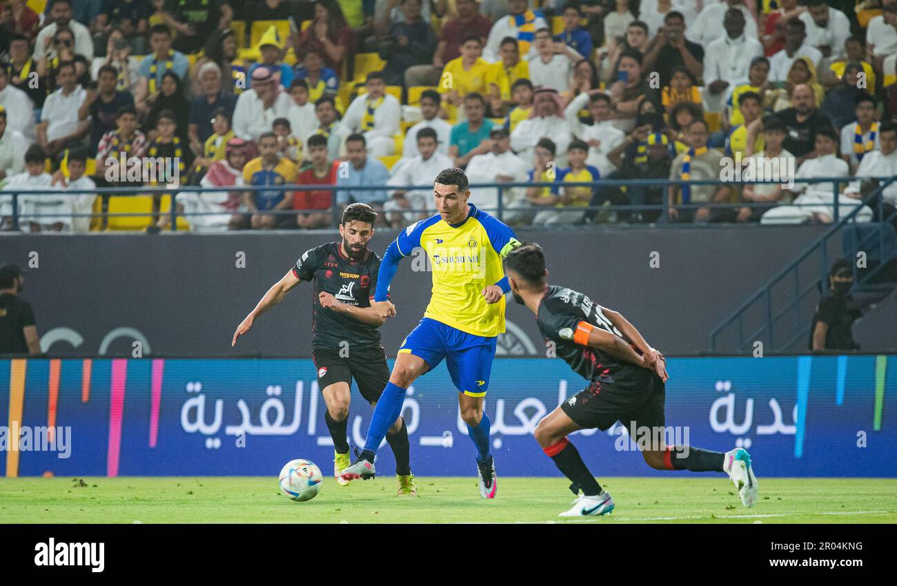 Cristiano Ronaldo of Al-Nassr FC in action against Al-Raed FC during ...