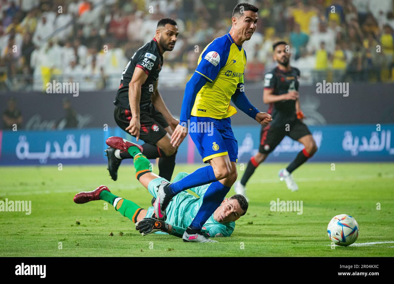 Cristiano Ronaldo of Al-Nassr FC in action against Al-Raed FC during ...
