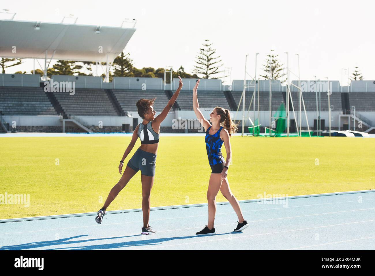 Finished with a bang. Full length shot of two attractive young female ...