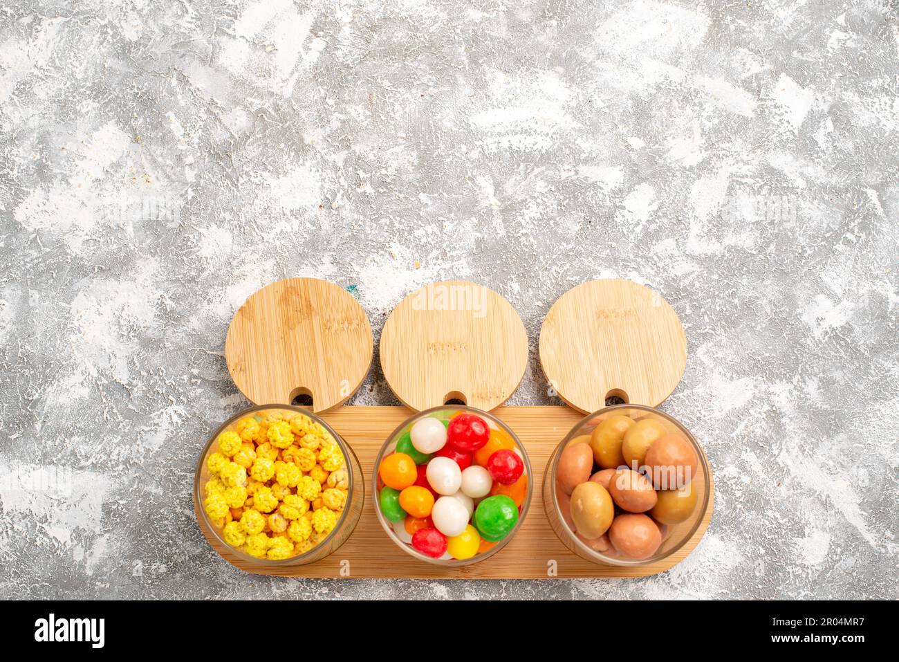 top view different candies colorful sweets on a white background candy ...