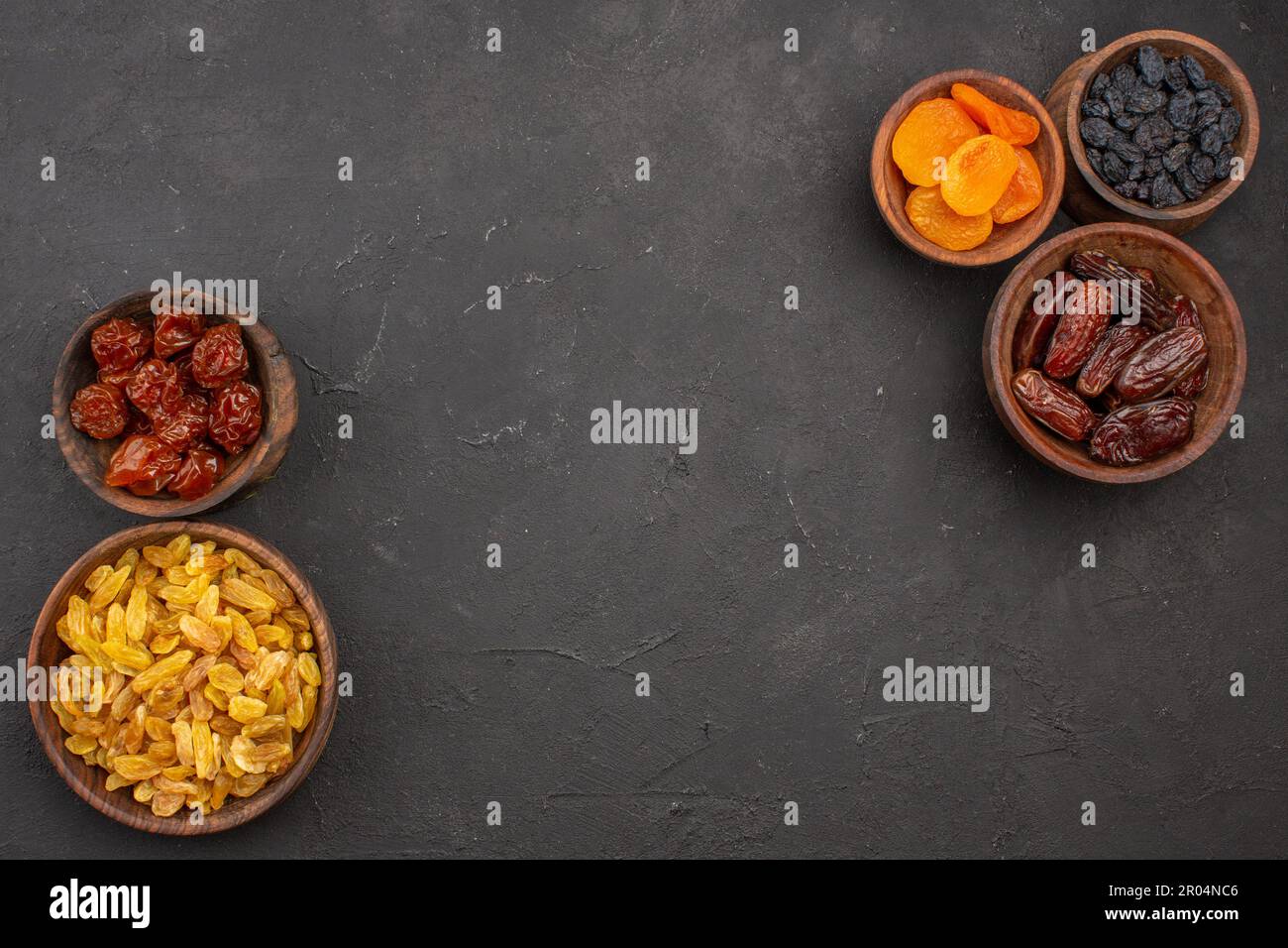 top view dried raisins inside little pots on grey background raisin dry ...