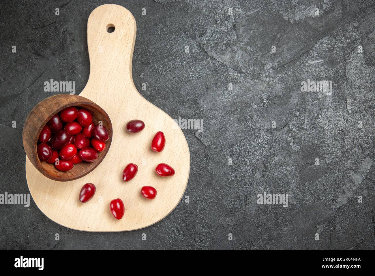 top view fresh red dogwoods on dark-grey background fruit mellow tree ...