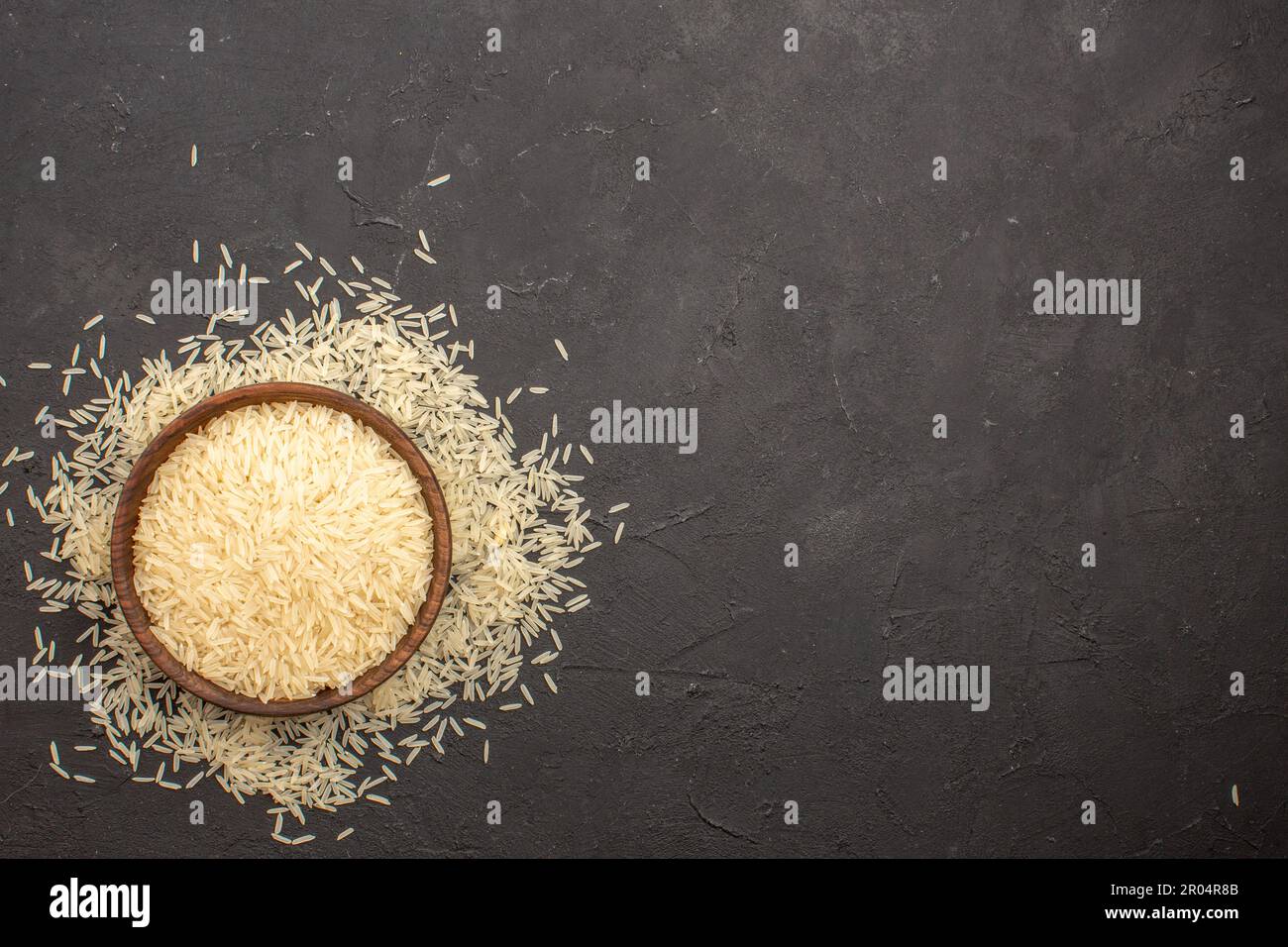 top view raw rice inside plate on dark-grey background rice raw food ...